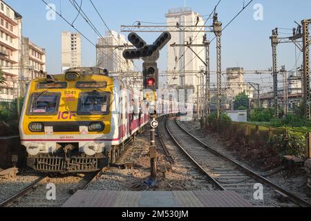 A local commuter train arriving at Chhatrapati Shivaji Maharaj Terminus ...