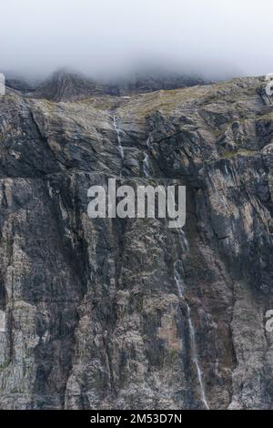 Cirque de Gavarnie with waterfall at massive high rock wall formation ...