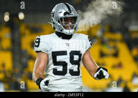 Las Vegas Raiders linebacker Luke Masterson, left, tackles Los Angeles ...