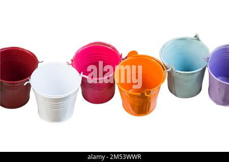 Multi-colored small metal buckets. Decorative buckets in different ...