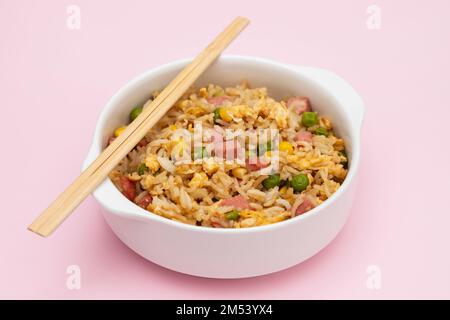 Rice with corn. peas, ham on white small bowl Stock Photo - Alamy