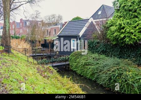 full frame view of beautiful house with windows and open wooden ...