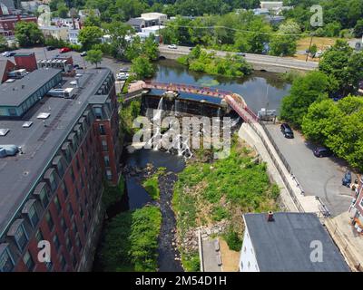 Spicket Falls Mill at Spicket River aerial view Methuen downtown in ...