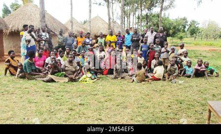 Lusaka, Uganda. 01st Dec, 2022. Musa Hasahya (right) on his farm with ...