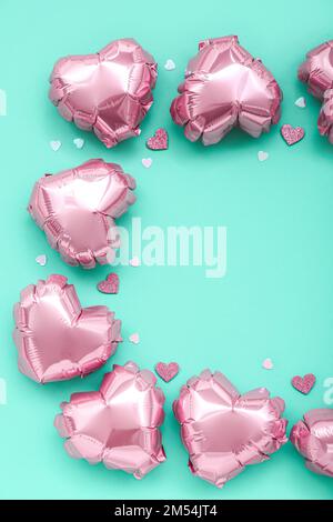 Frame made of heart-shaped balloons on red background. Valentine's Day ...