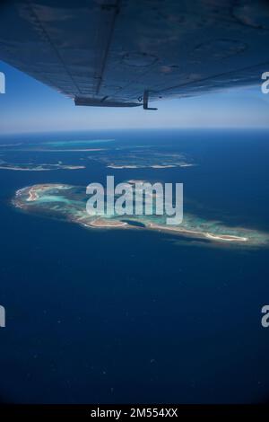 An aerial view islands surrounded by blue ocean Stock Photo - Alamy