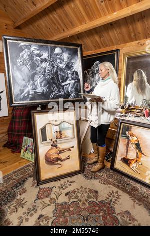 Picture shows artist Debbie Harris working in her garden studio based ...