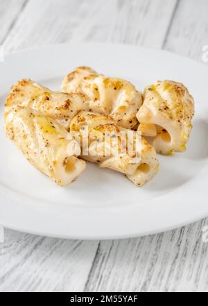 Portion of fried asian style calamari on the plate Stock Photo - Alamy