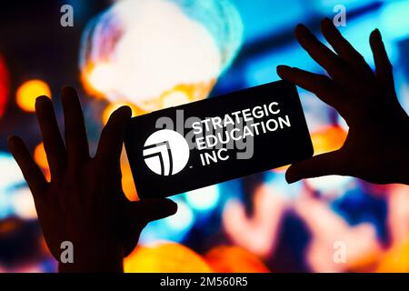 In this photo illustration a Strategic Education logo seen displayed on ...