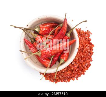 Bowl of chipotle jalapeno peppers and flakes on white background Stock ...