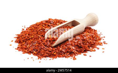 Heap of chipotle chili flakes and scoop on white background Stock Photo ...
