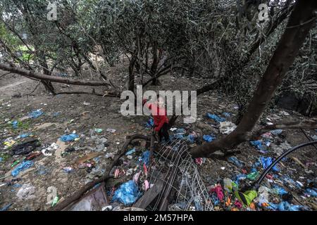 A young girl plays in the slums of Anarba, one of the poorest slums of ...