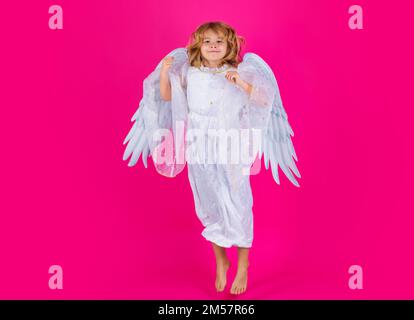 Little angel jump, kids jumping, full body. Cute angel kid, studio ...