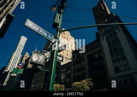 Blue West 35th Street sign in Midtown Manhattan in New York City - okt ...