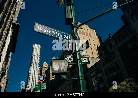 Blue West 35th Street sign in Midtown Manhattan in New York City - okt ...
