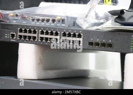Networking ethernet 24 port switch isolated on white background ...