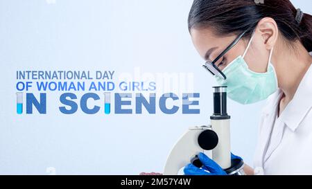 Asian scientists use microscopes with a colored background ...