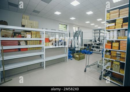 Modern warehouse full of cardboard boxes Stock Photo - Alamy