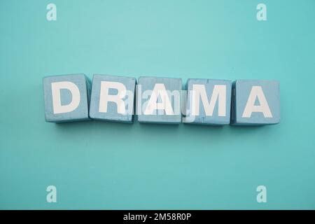 Drama word created with cubes alphabet letters on blue background Stock ...