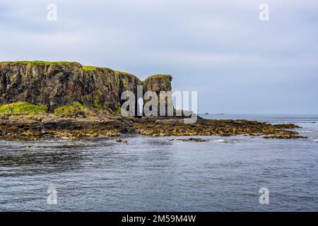 Dramatic sea cliff on Cairn na Burgh Mòr, one of the uninhabited ...