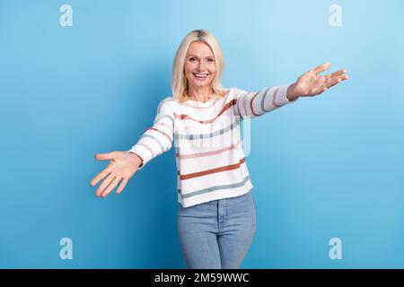 Photo of adorable excited lady wear striped t-shirt smiling practicing ...