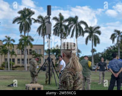 Col. Michele Lo Bianco, 15th Wing commander, briefs staff delegation ...