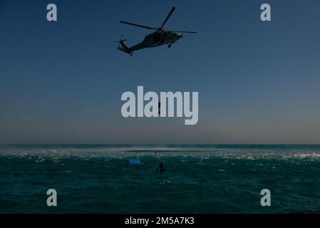 220215-N-CR519-2567 ARABIAN GULF (Feb. 15, 2022) A diver with ...