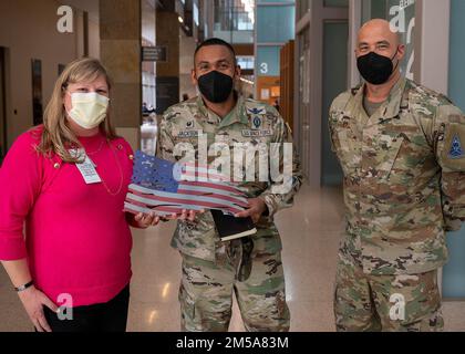 Col. Marcus Jackson, Buckley Garrison commander, and his family pose ...