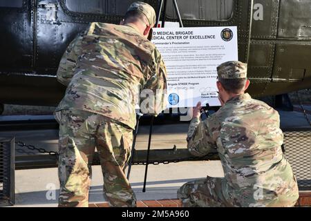 The 32d Medical Brigade Commander, Army Col. Marc Welde and Cmd. Sgt ...