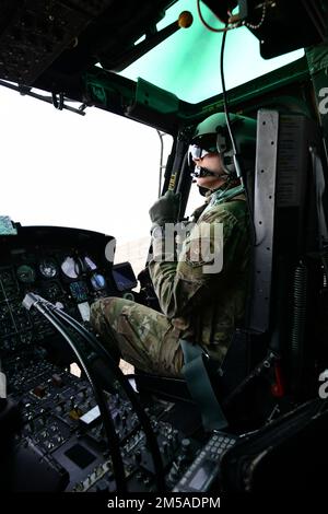 Capt. Nicole Poupart, 37th Helicopter Squadron pilot, flies the UH-1N ...