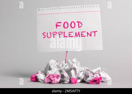Sign displaying Food Supplement, Word Written on Conditions and ...