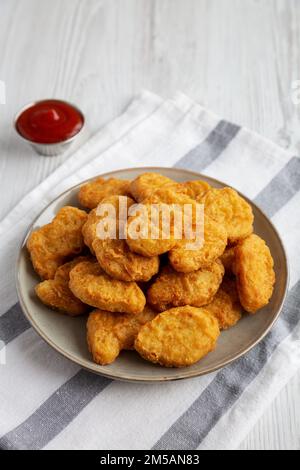 Homemade Chicken Nuggets with Ketchup, side view Stock Photo - Alamy