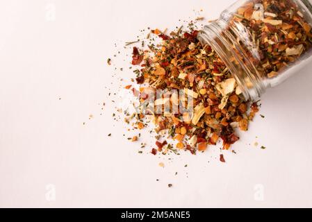 Soffritto Seasoning Spilled from a Jar Stock Photo - Alamy