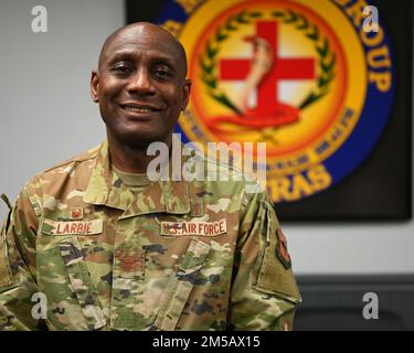 U.S. Air Force Col. Derek Salmi, left, 60th Air Mobility Wing commander ...