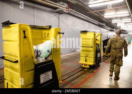U.S. Army Staff Sgt. Andrew Zegura crosses the archway during a ...