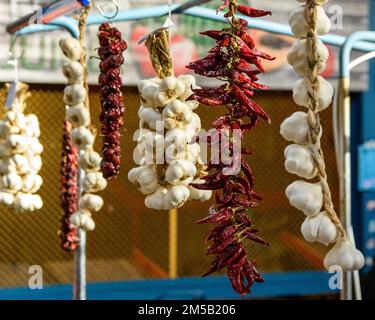 Strings of red peppers dry on house in Serbian village Donja Lokosnica ...