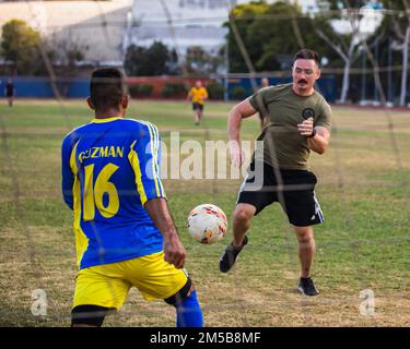 US Navy Operations Specialist 1st Class stands Combat Information ...