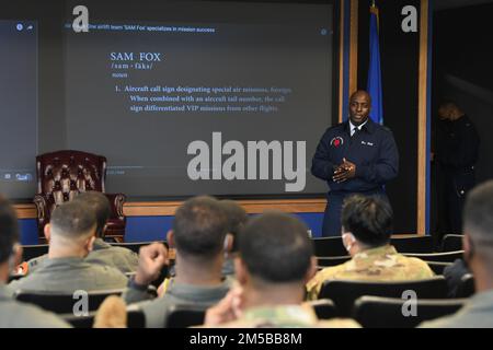 Airmen assigned to the 89th Aerial Port Squadron put ramps in place to ...