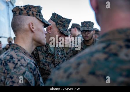 The commanding officer of the 11th Marine Expeditionary Unit addresses ...