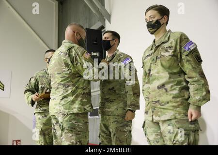 U.S. Army Capt. Caleb Hartley, commander, headquarters and headquarters ...