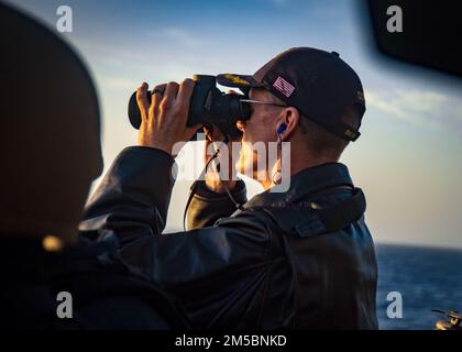 The guided missile destroyer USS Delbert D. Black (DDG 119) fires a MK ...