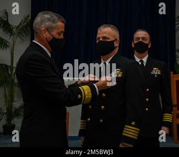 Rear Adm. Pete Garvin, left, commander, Naval Education and Training ...