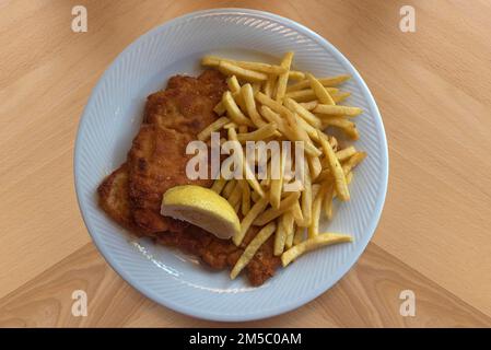 Wiener Schnitzel with french fries, Bavaria, Germany Stock Photo - Alamy