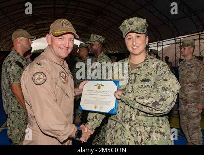 U.S. Marine Corps Capt. Andrea Occhipinti, right, and Capt. Christopher ...