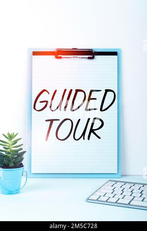 Hand writing sign Guided Tour. Business concept advice or information ...
