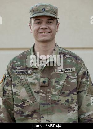 Spc. Kyle Combest, Oklahoma National Guard, climbs through an obstacle ...