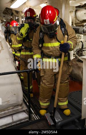 USS Ross damage control drill 140801 Stock Photo - Alamy