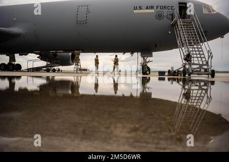 U.S. Airmen with the 660th Aircraft Maintenance Squadron swap an engine ...