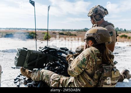 Airmen from the 822 Base Defense Squadron conduct heavy weapons ...