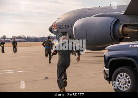 Alert crew members sprint toward a 126th Air Refueling Wing, KC-135 ...